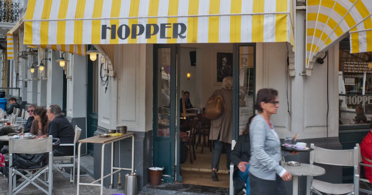 Kogelinslagen ontdekt aan raam van bekend café Hopper op Antwerpse Zuid ...
