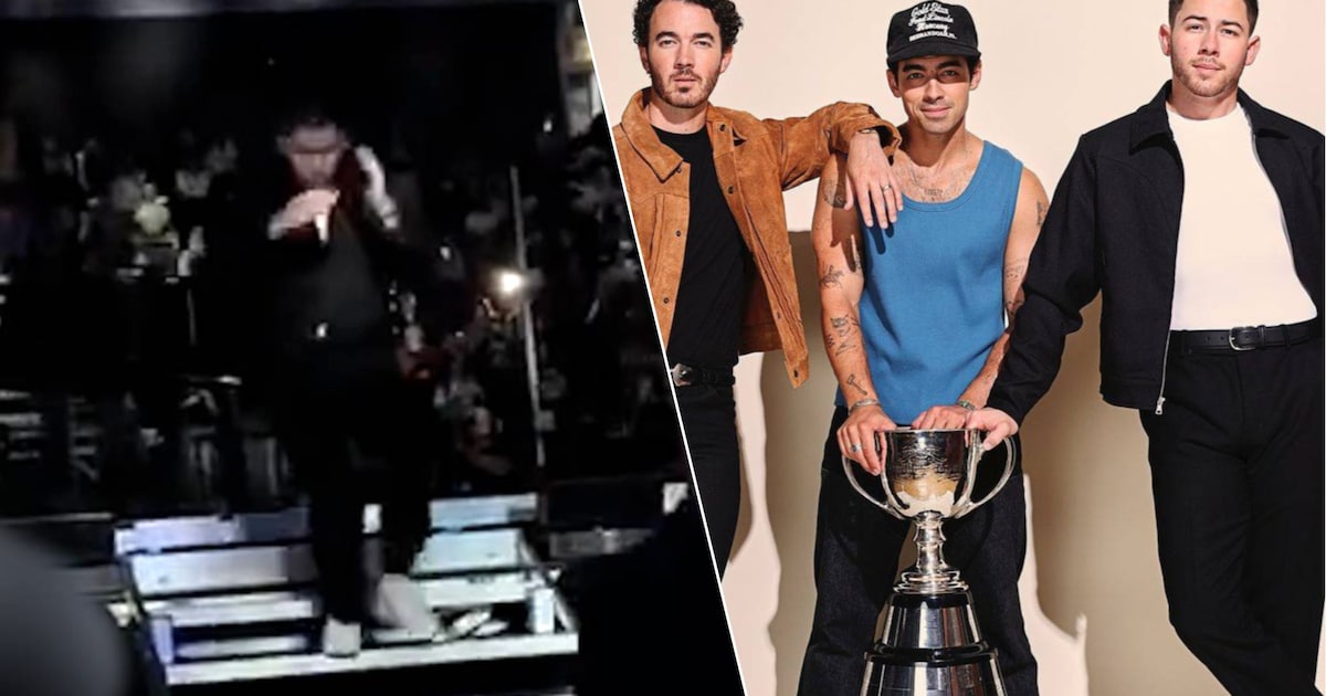 KIJK. Nick Jonas is bang voor een schutter in de zaal en stormt van ...