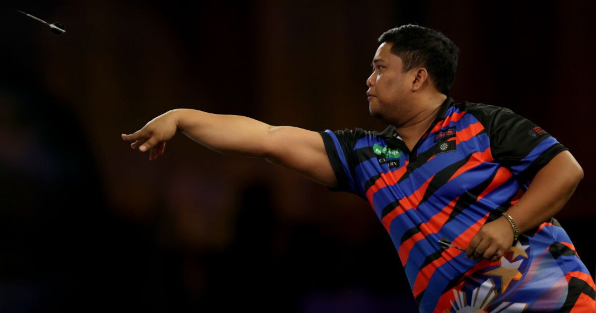 Filipijnse darter die met pijn in borst moest opgeven op WK darts ligt ...